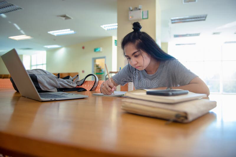 Student Learning in the Library Stock Image - Image of adult ...