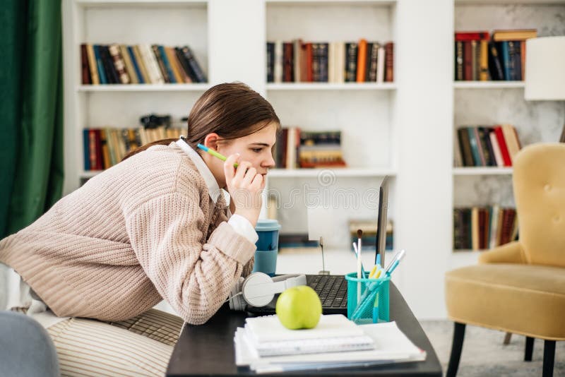 Student Learning on Line with Headphones and Laptop. Stock Image ...