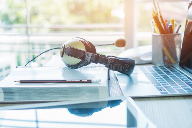 Student Learning Online Study Concept : Headphones on Books and ...