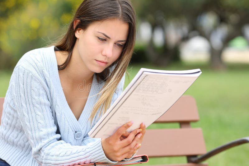 Student Learning Reading Notes in a Park Stock Image - Image of ...