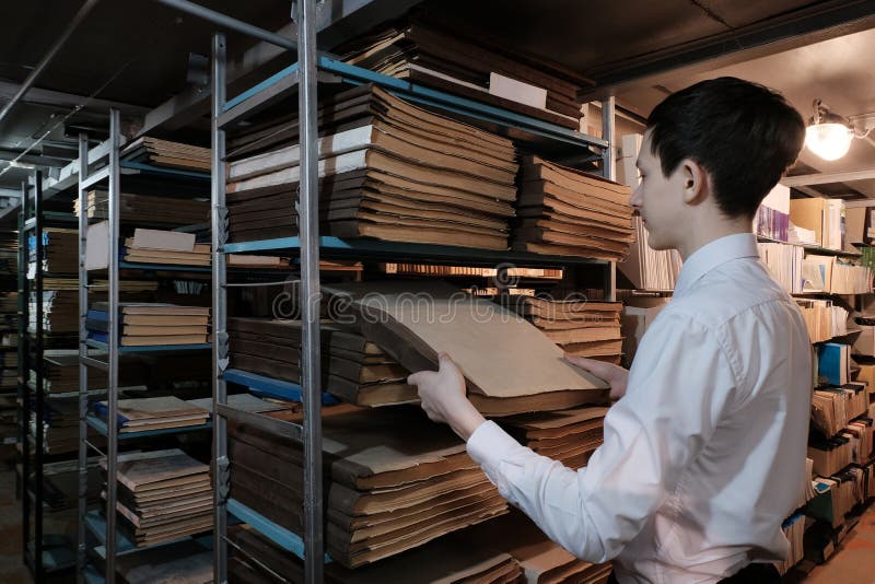 A Student in the Library or in the Archive Room is Looking for ...