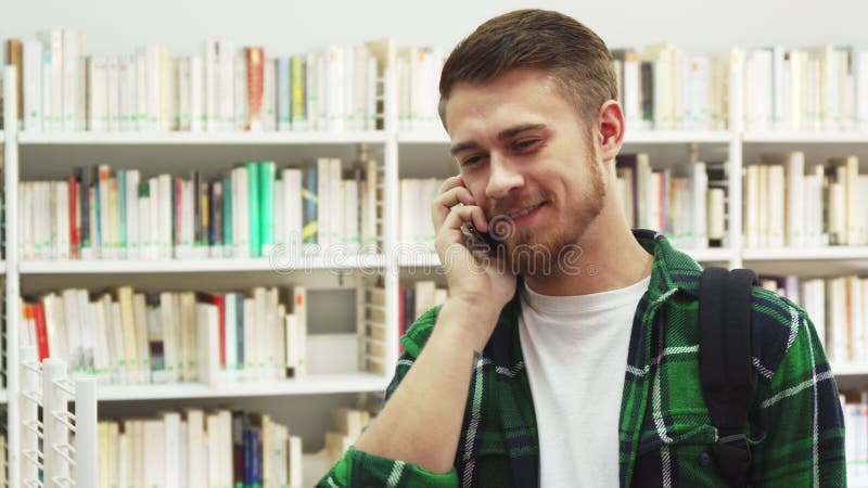 Young Student Calls by Mobile Phone Stock Photo - Image of lecture ...