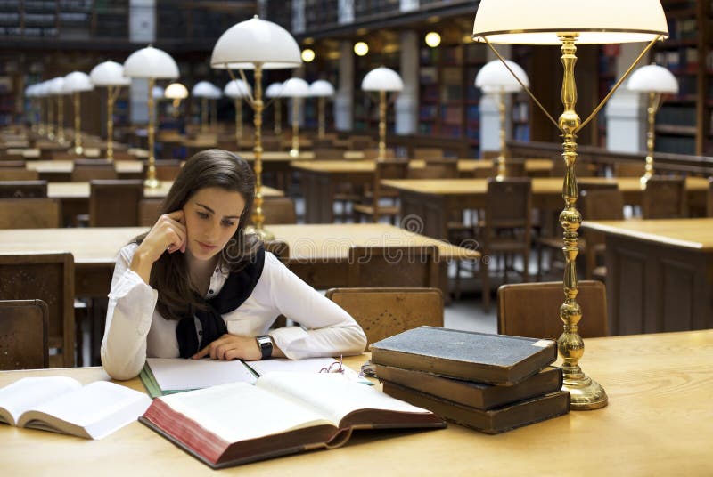 Woman studying in library stock photo. Image of knowledge - 13668042