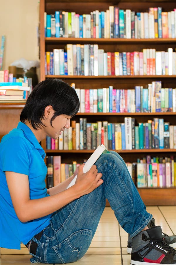 Student in Library Reading Book Stock Image - Image of information ...