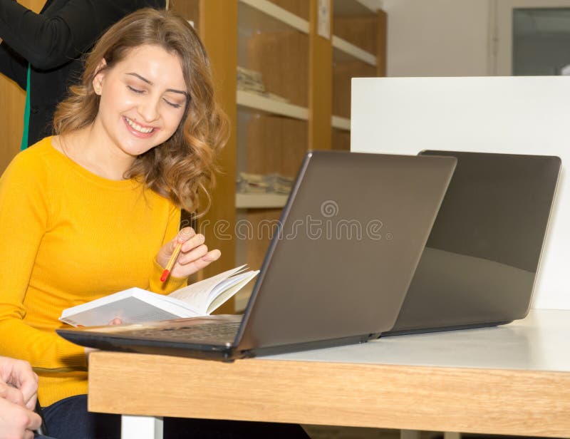 Student in library stock image. Image of attractive, ladies - 91330865