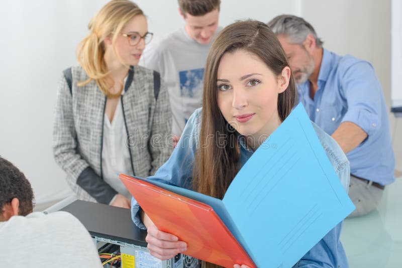 Student looking at file stock image. Image of business - 89548071