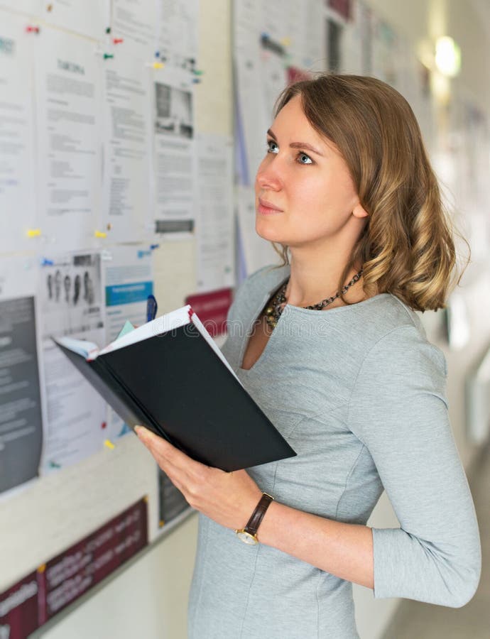 Student Looking through Job Offers. Stock Image - Image of offer ...