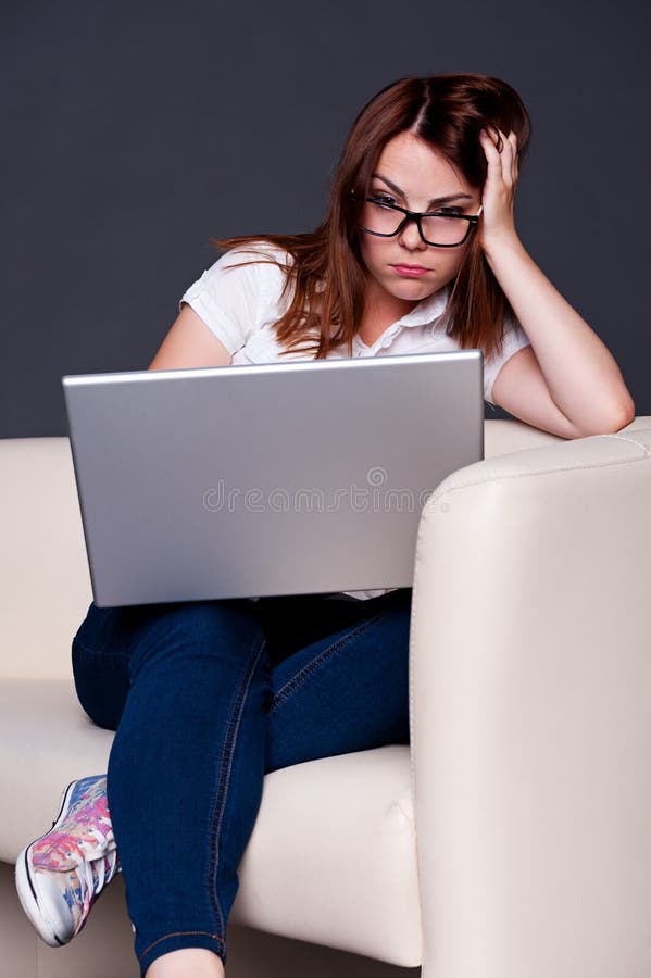 Student looking on laptop stock photo. Image of technology - 26401812