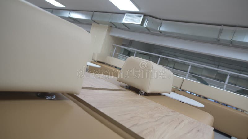 Student Lounge with Soft Chairs and Tables in Open Layout Stock Video ...