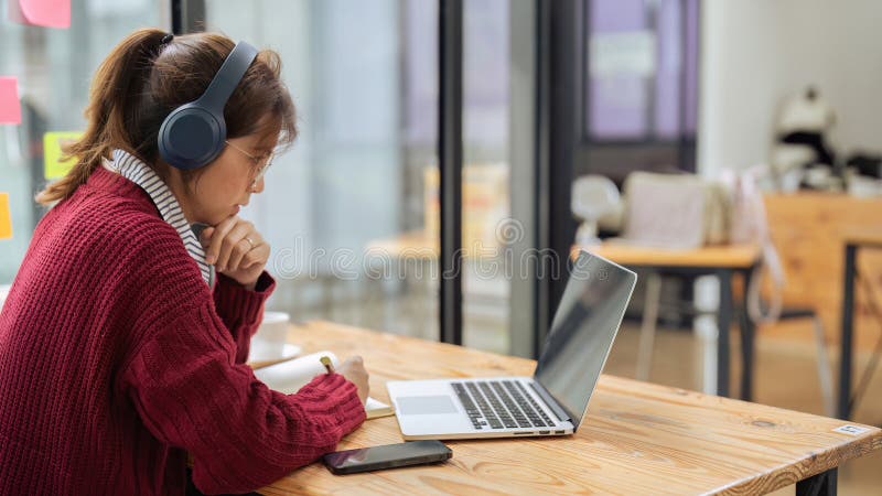 Student Making Notes during Online Lesson at Co Working Space Stock ...