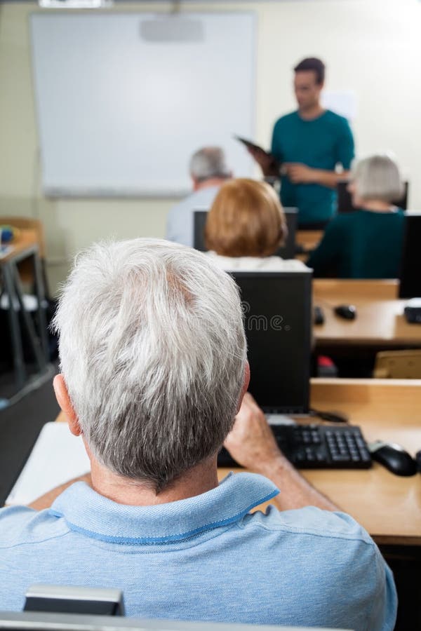 Student with Male Teacher in Computer Class Stock Photo - Image of ...