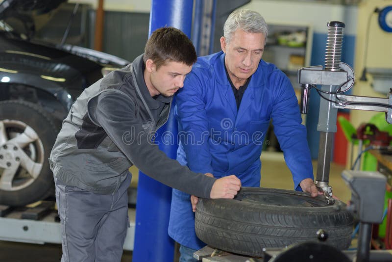 Student in Mechanics Working on Car Engine Stock Photo - Image of ...