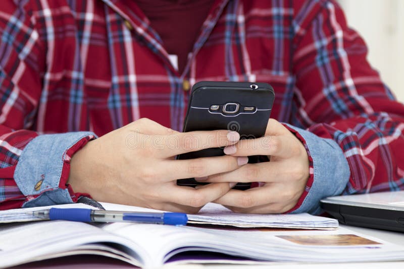 Student with mobile phone stock photo. Image of chat - 86729670