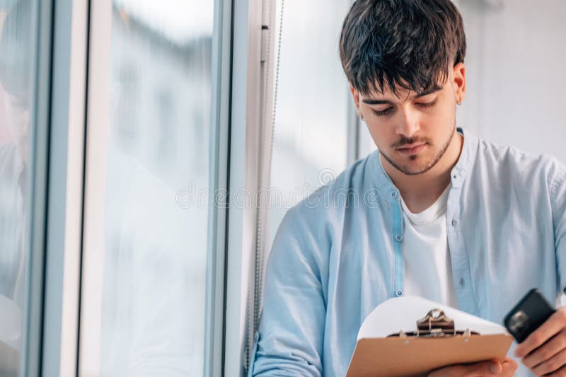 Student Mobile Phone Reviewing Documentation Stock Photos - Free ...