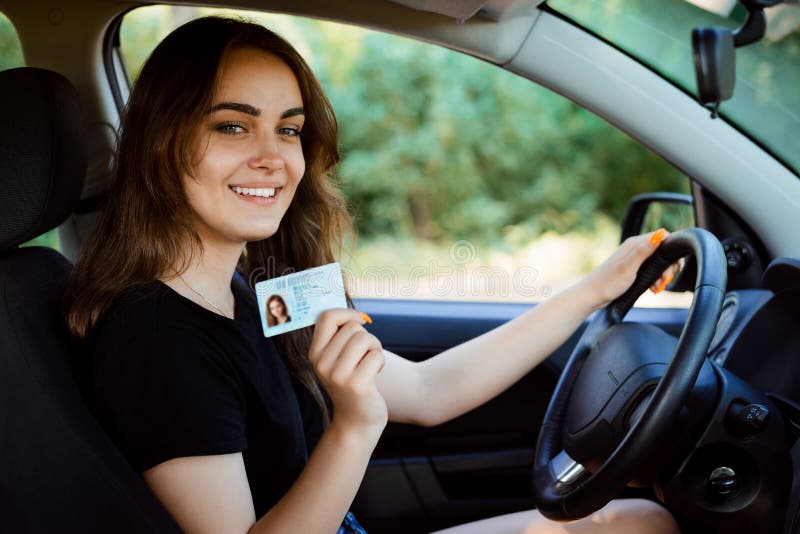 Student in a Modern Car Showing Driving Licence Stock Image - Image of ...