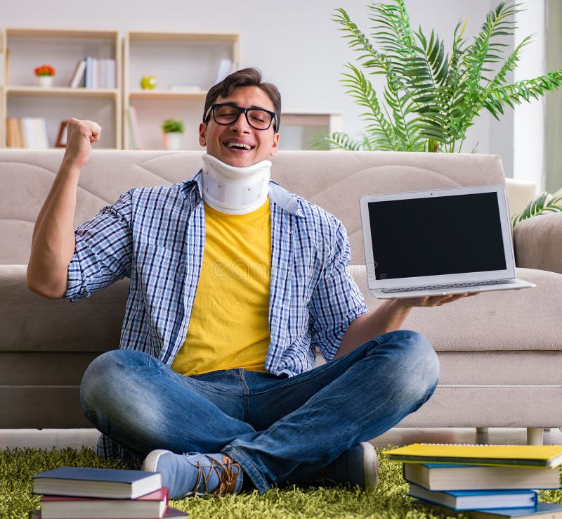 Student with Neck Injury Preparing for Exams Stock Photo - Image of ...