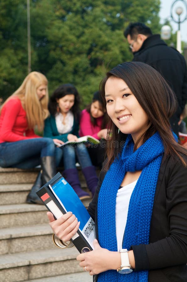 Student with Notebook stock photo. Image of notepad, holding - 12180554