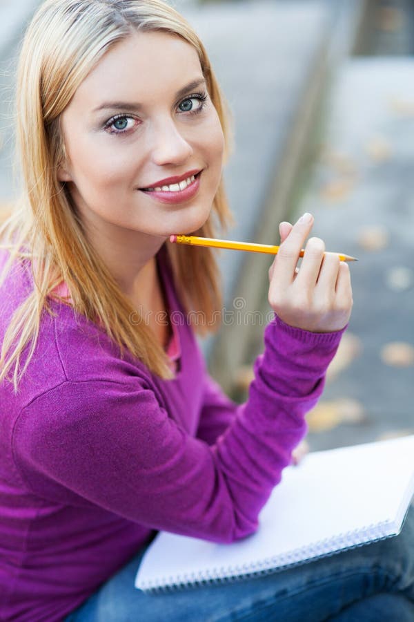 Student with Notebook and Pencil Stock Image - Image of people ...