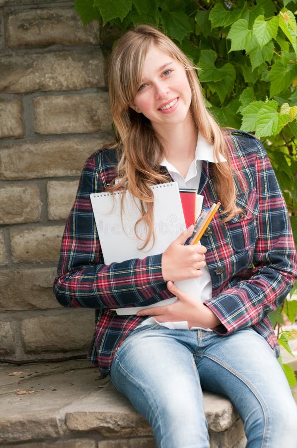 Student with notebooks stock image. Image of casual, book - 15383067