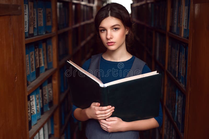 Student with Open Book in College Library. Stock Image - Image of ...