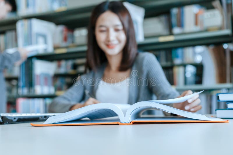 Student with open book stock photo. Image of campus, book - 41919952