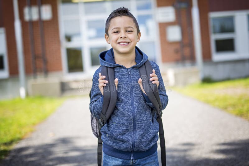 Student Outside School Standing Smiling Stock Photo - Image of ...