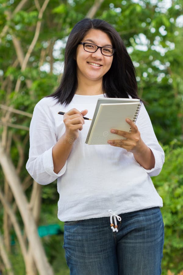 Student in the park stock photo. Image of holding, education - 30785700