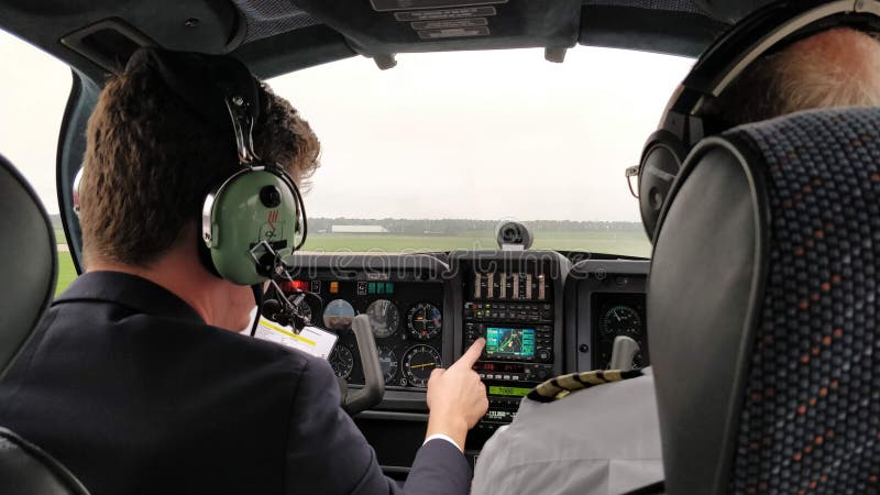 Student Pilot Checking the Navigation Equipment of a TB-10 Aircraft ...