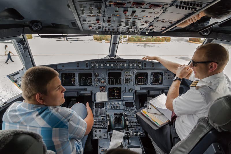 Student and Pilot Talking in the Plane Cockpit Editorial Stock Photo ...