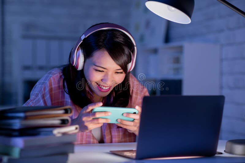 Student play game on phone stock photo. Image of mobile - 150248774