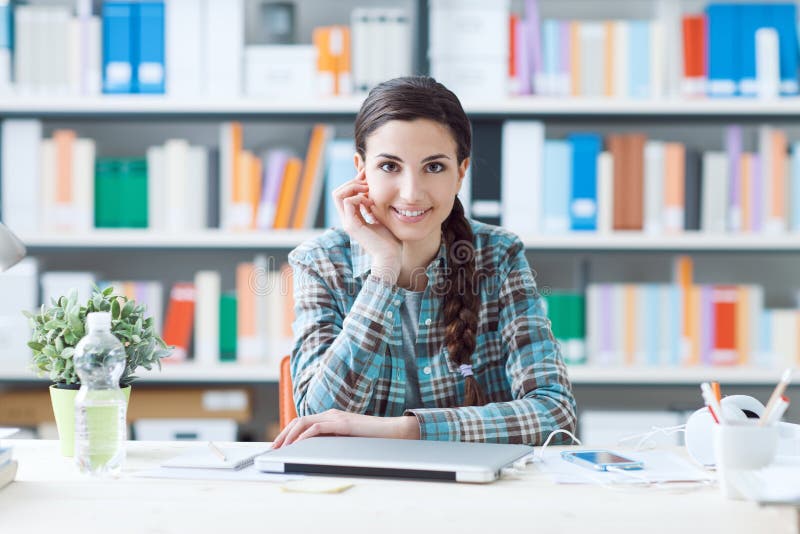 Student Posing in the Library Stock Photo - Image of academic, desktop ...