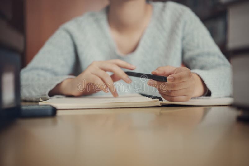 Student Preparing for College Test, Exam, Reading Book, Studying ...