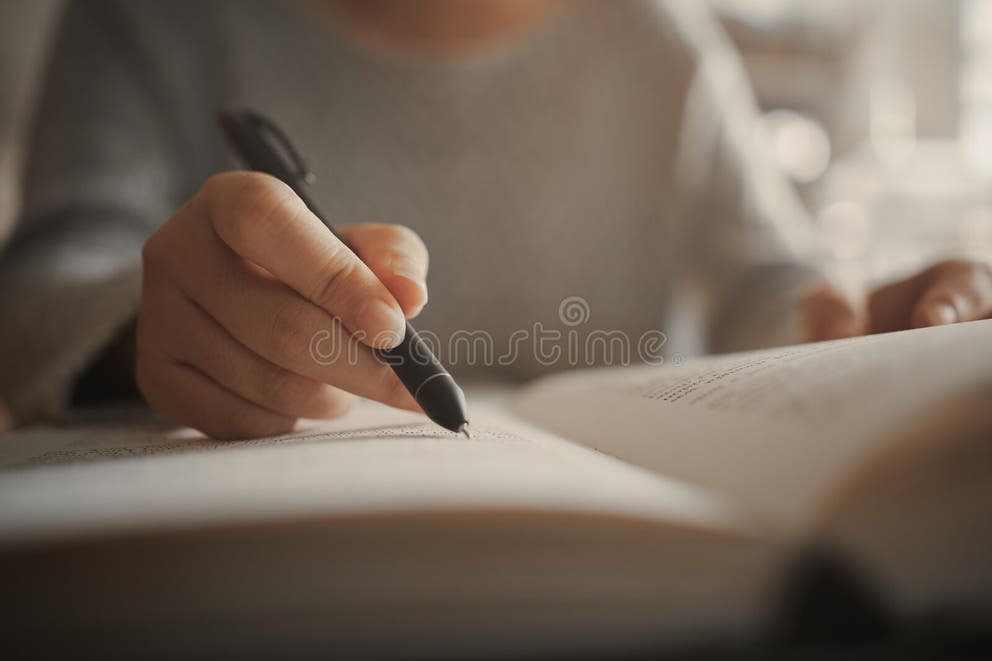 Student Preparing for College Test, Exam, Reading Book, Studying ...
