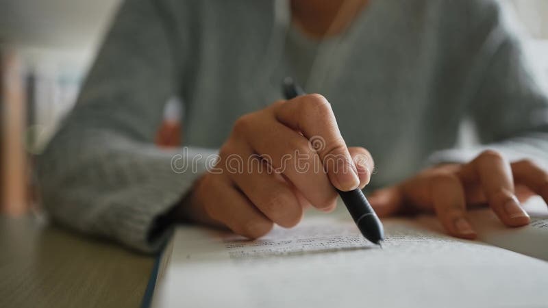 Student Preparing for College Test, Exam, Reading Book, Studying ...