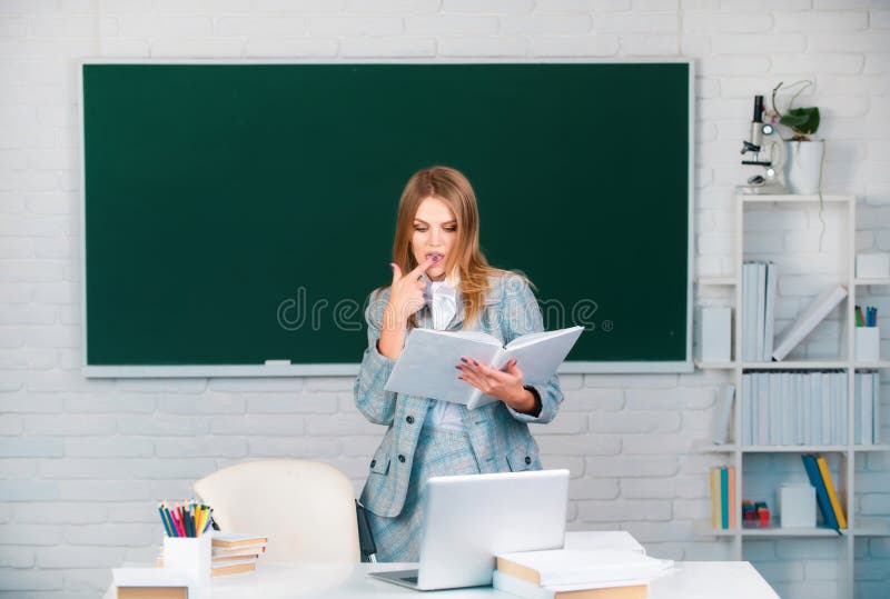Student Preparing Exam and Learning Lessons, Reading Book in School ...
