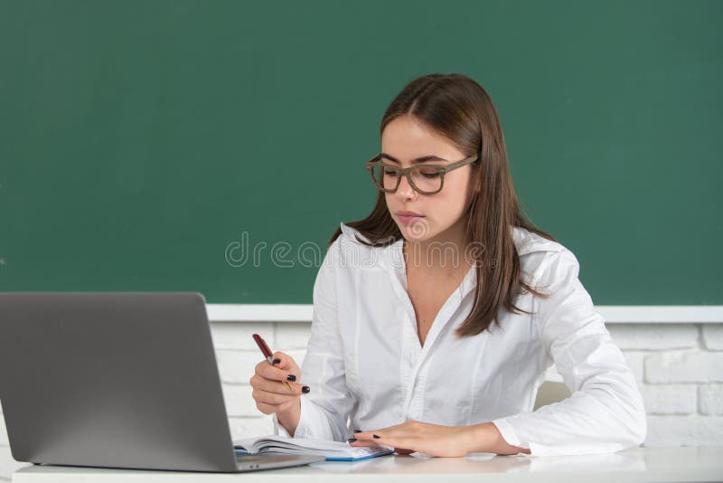 Student Preparing Exam and Learning Lessons in School Classroom, Online ...