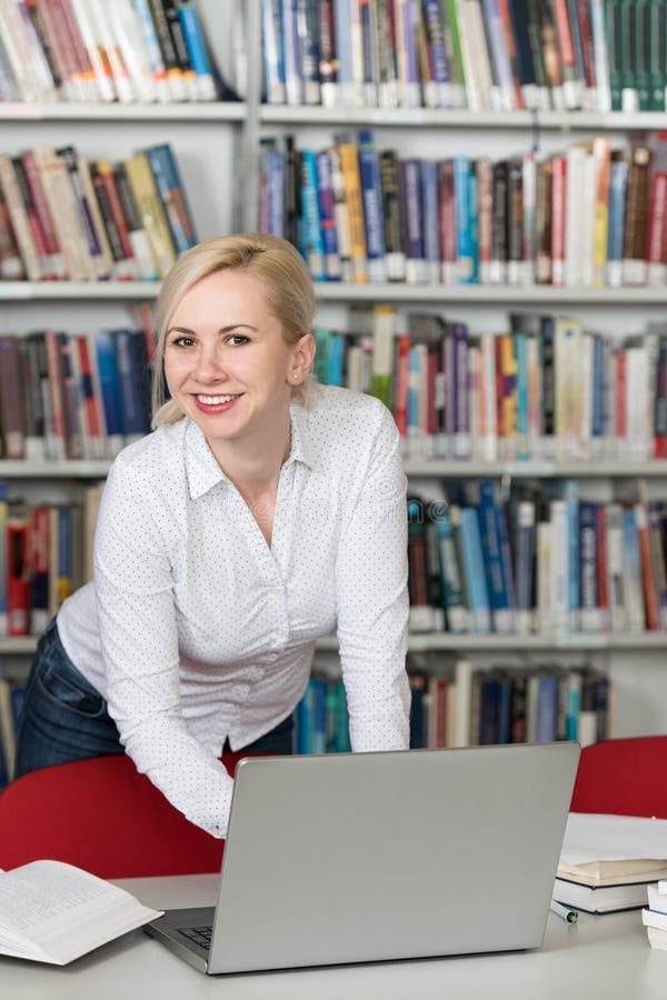 Portrait of a Student in a Library Stock Photo - Image of reading ...