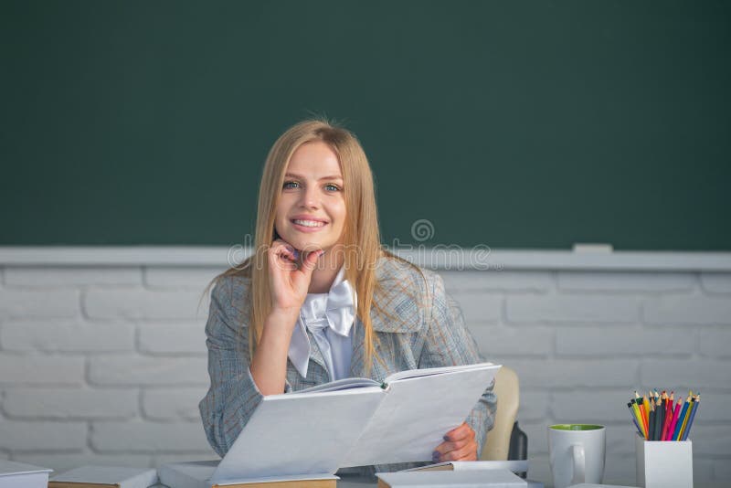 Student Preparing Exam Reading Book and Learning Lessons in School ...
