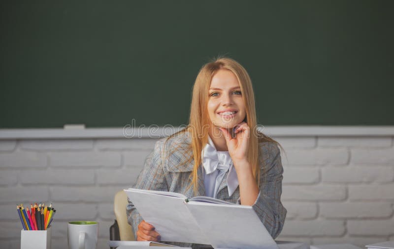 Student Preparing Exam Reading Book and Learning Lessons in School ...