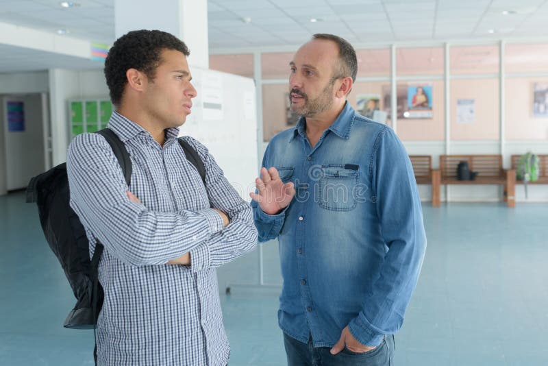Student and Professor Having Casual Conversation Stock Photo - Image of ...