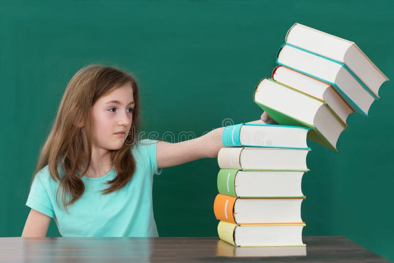 Student Pushing Stack of Books Stock Image - Image of blackboard, desk ...