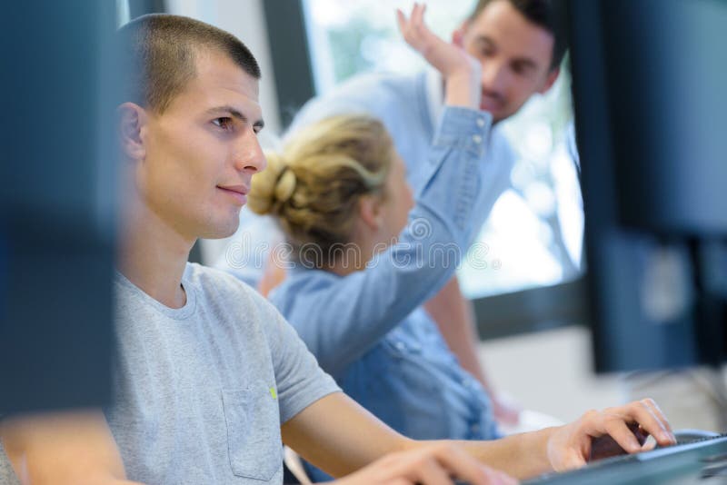 Student Raising Hand To Ask Question in Computer Class Stock Image ...