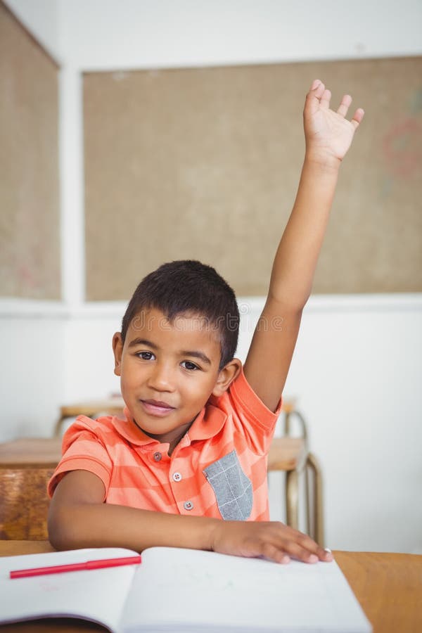 Student Raising Hand To Ask a Question Stock Photo - Image of desk ...