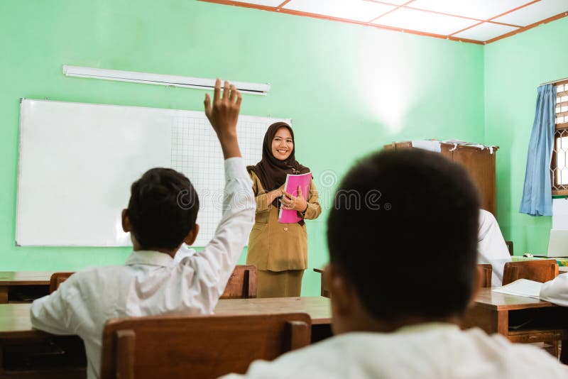Indonesian Teachers Who are Helping Their Students Stock Image - Image ...
