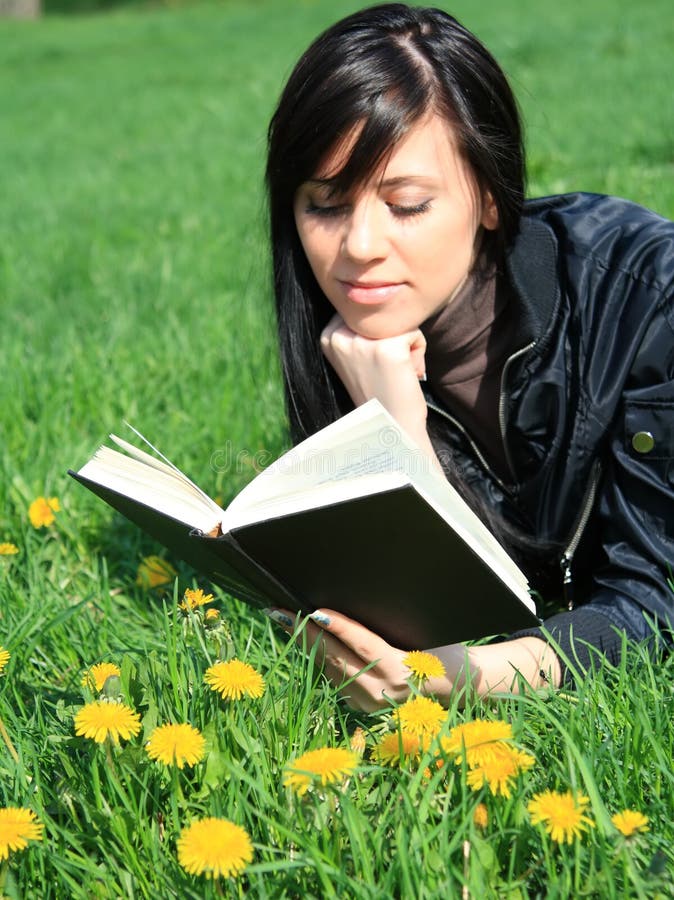 Woman reading book stock photo. Image of learning, outdoors - 14477902