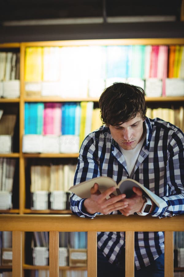 Student Reading Book in College Library Stock Image - Image of ...
