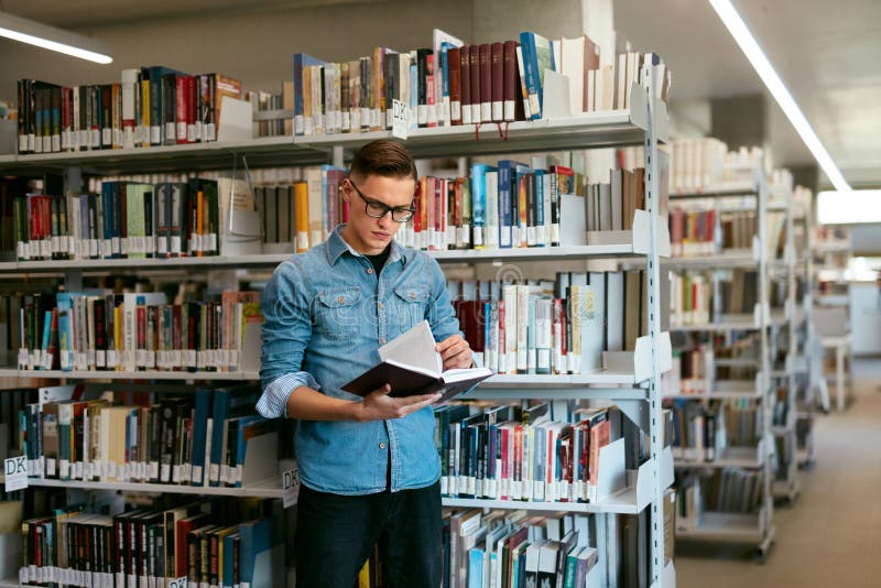 Student Reading Book in College Library Stock Image - Image of homework ...