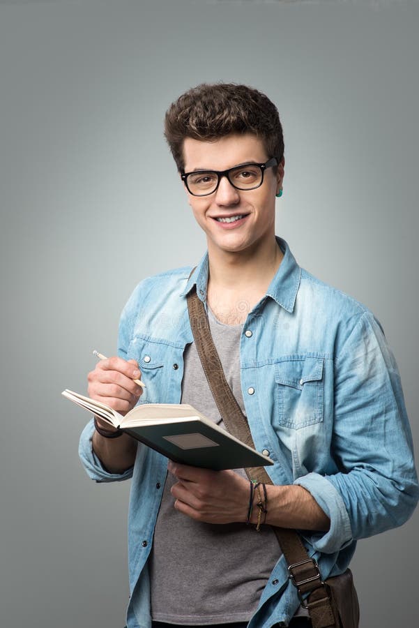 Student reading a book stock image. Image of jeans, reading - 49890877