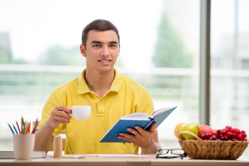 The Student Reading Book and Drinking Tea Stock Image - Image of ...