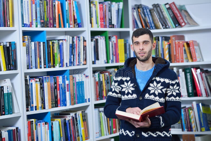 Student Reading Book in Library Study Lessons for Exam. Stock Photo ...